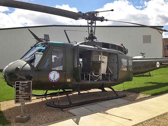 The legendary UH-1H Huey helicopter, whose distinctive "whop-whop" soundtrack became the unofficial theme music of the Vietnam War.