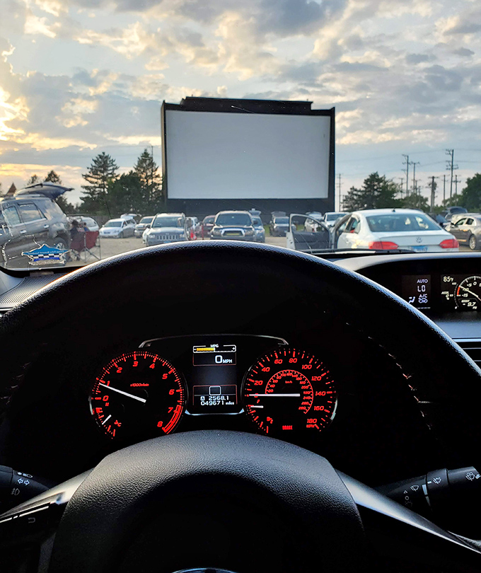 The best seats in the house are the ones you drove there, with dashboard lights creating the perfect ambient glow.