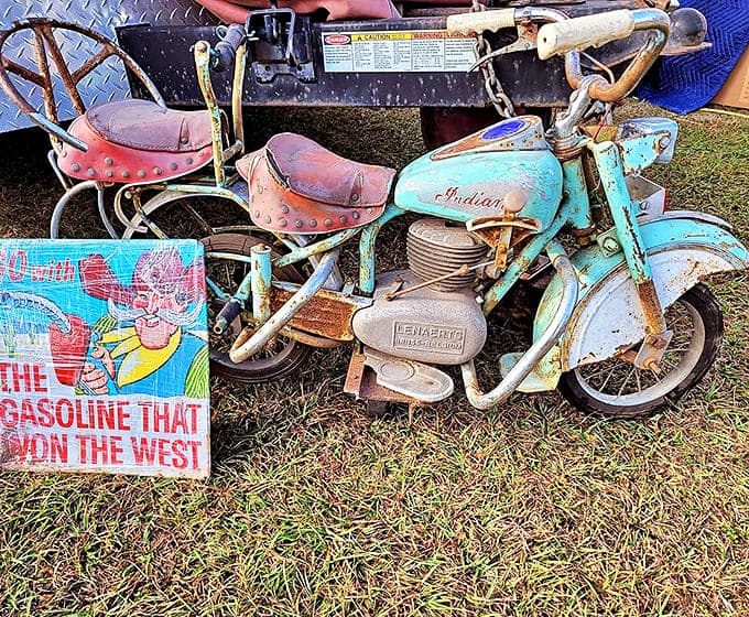Vintage Indian Motorcycle: A weathered turquoise Indian motorcycle sits like a time capsule on wheels, its patina telling stories of adventures long past.