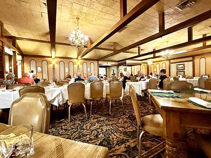 The dining room hums with conversation as multi-generational families continue traditions and first-timers discover what the fuss is all about.