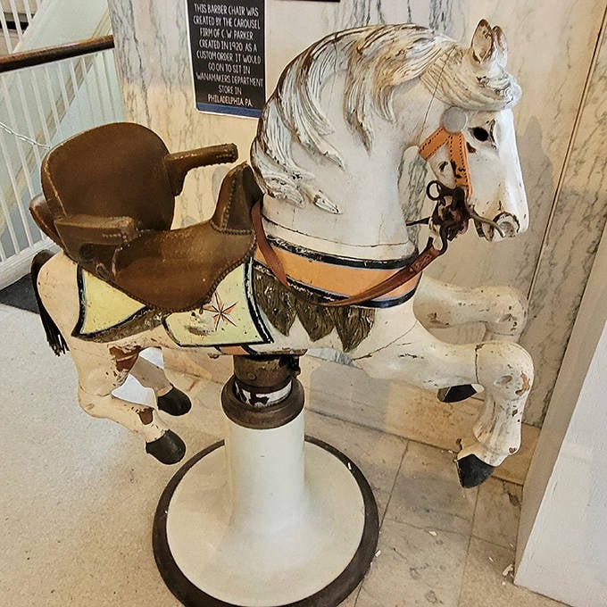 Before theme park thrills, this vintage barber chair horse offered children the novel experience of getting a "haircut" while enjoying their carousel ride.