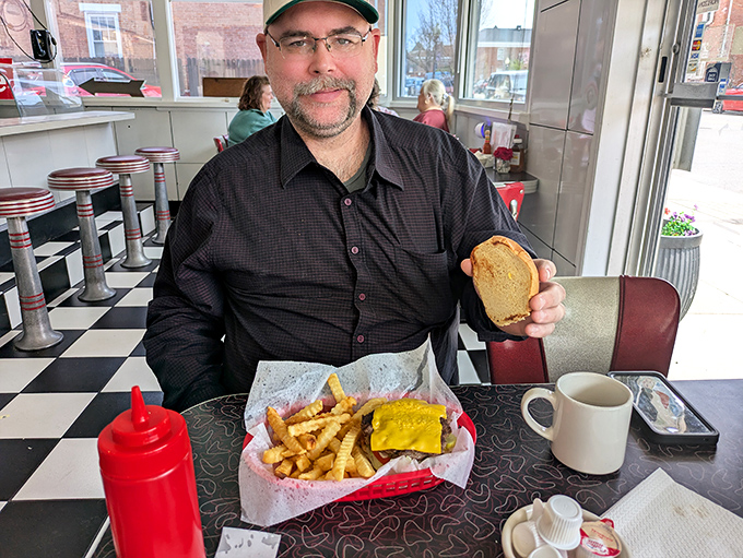 A customer enjoying the diner experience with a classic breakfast spread &ndash; the kind of meal that makes you want to linger over coffee and conversation.