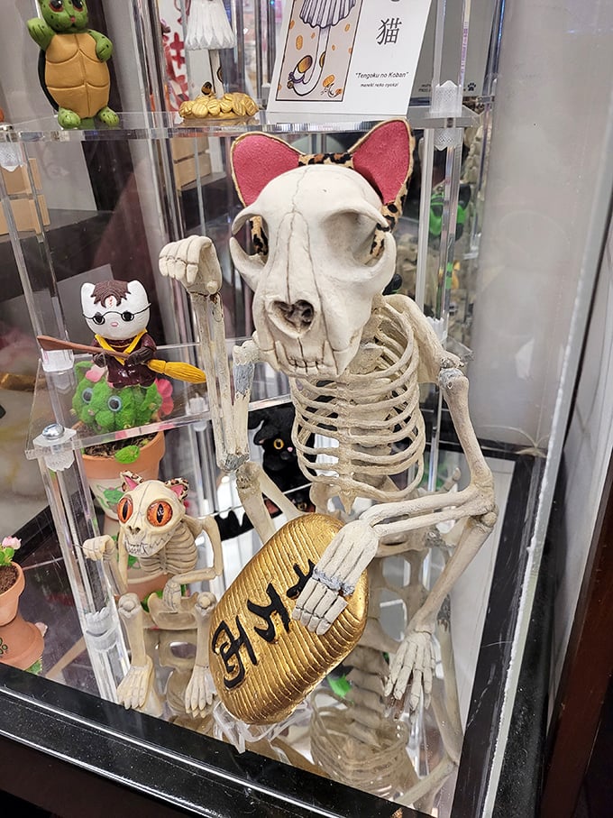 Even in skeletal form, the lucky cat maintains its charm &ndash; this macabre yet whimsical interpretation offers a playful twist on tradition.