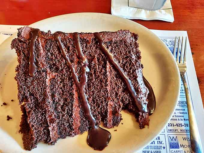 Chocolate cake that doesn't mess around&mdash;rich, moist layers drizzled with sauce. Dessert or decadence? At Brown Bear, they're one and the same.