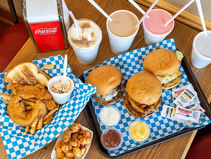 A feast fit for American royalty &ndash; golden-fried favorites, juicy burgers, and creamy milkshakes create a tableau of classic drive-in delights.