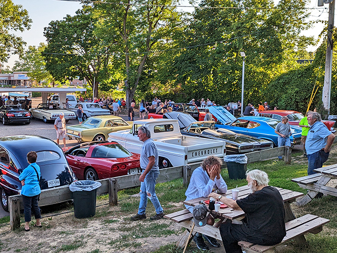 Classic car enthusiasts gather weekly, turning the parking lot into an impromptu automotive museum where history gleams under Minnesota sunshine.