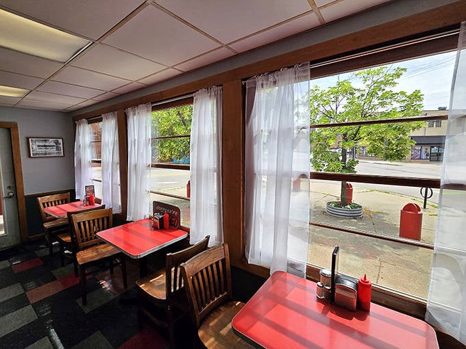 The cozy interior creates an atmosphere where strangers become friends over shared appreciation for perfectly crafted comfort food.