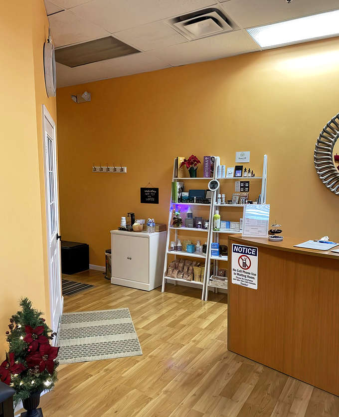 The bright, cheerful entry area welcomes guests with sunshine-yellow walls and a promise of the peaceful experience to come.