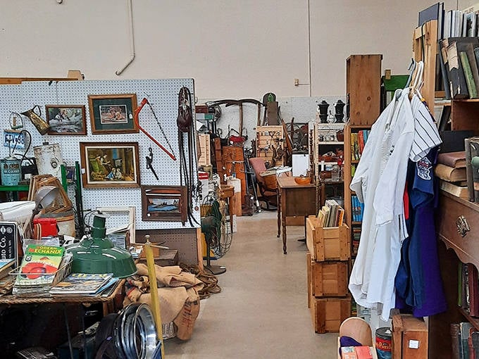 Art from various periods adorns the walls, from amateur landscapes to prints that might be worth something to the right collector.