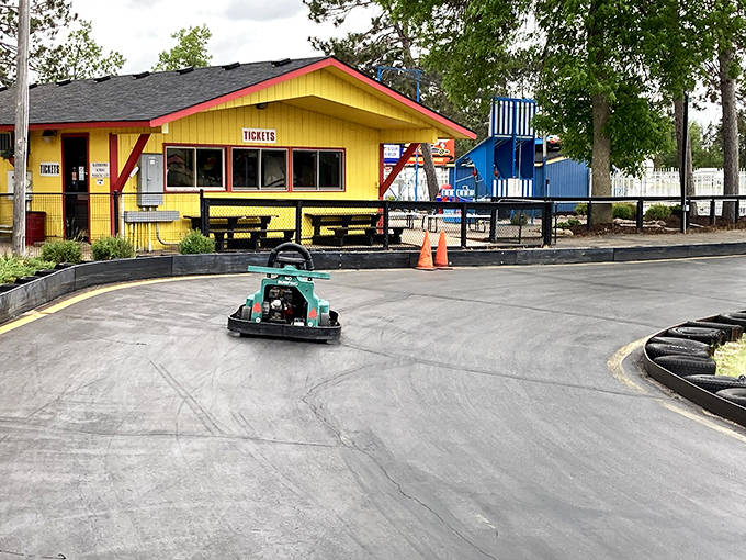 Taking the final curve with style &ndash; this solo racer demonstrates why go-karting remains the ultimate "forget your troubles" activity for all ages.
