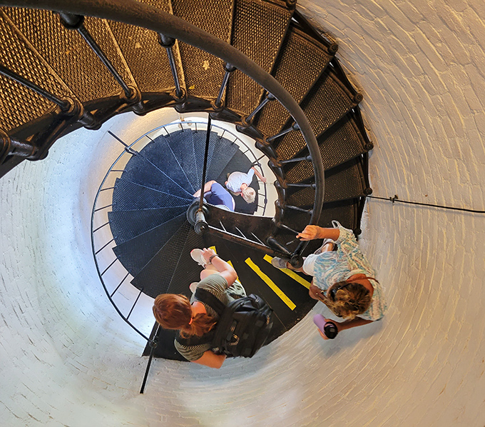 Looking down the spiral staircase creates a hypnotic pattern &ndash; a dizzying perspective that lighthouse keepers navigated daily.