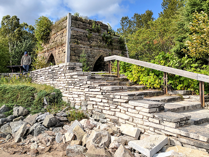 History set in stone: the Bay Furnace ruins stand as silent witnesses to an industrial past, now reclaimed by peaceful wilderness.