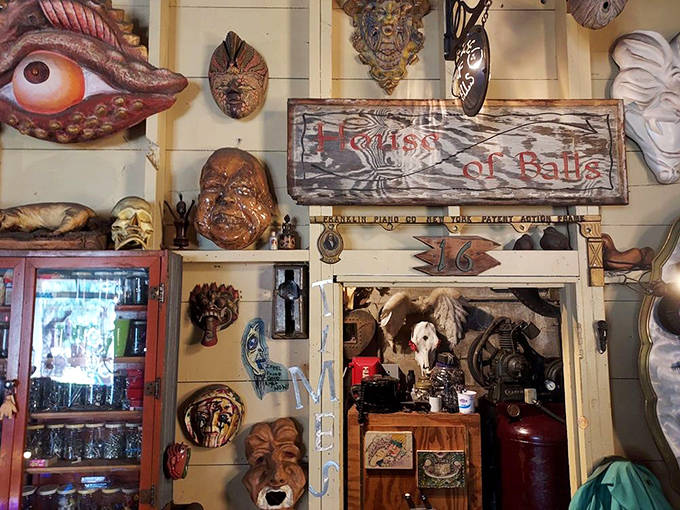 Faces peer from every surface &ndash; these metal visages range from contemplative to comical, each with a personality forged from forgotten materials.