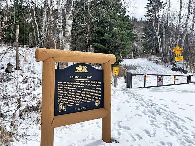 This historical marker tells the geological tale of Palisade Head's formation, a billion-year story written in ancient volcanic rock.