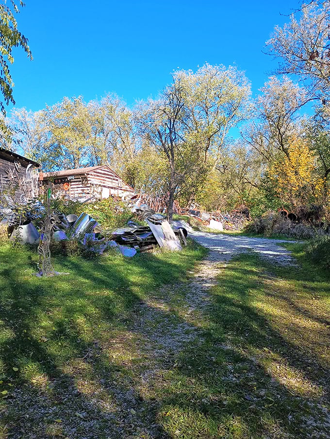 An ethereal metal angel rises from the earth, its delicate form belying the industrial strength of its salvaged components.