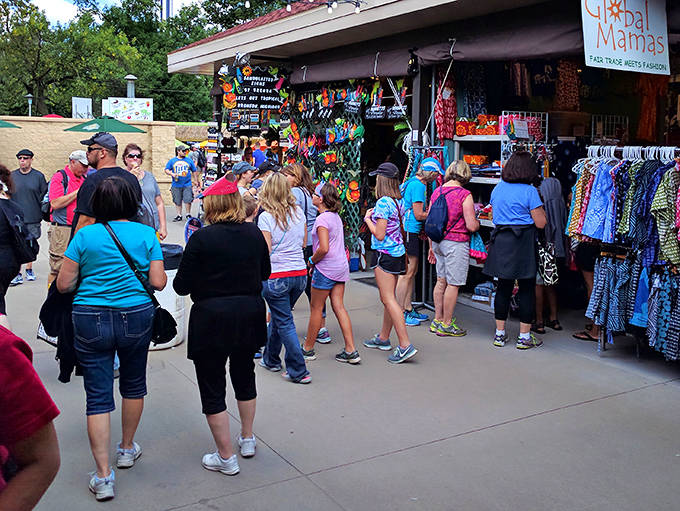 The Global Mamas stall draws curious shoppers like a magnet, offering fair trade treasures and stories from artisans who created them worlds away.