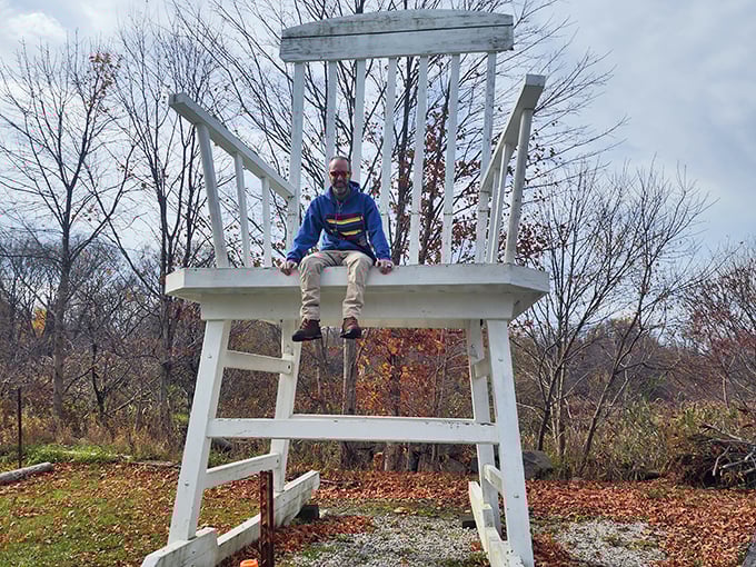 Seating beneath the chair's massive frame offers a fresh perspective &ndash; suddenly your problems seem appropriately sized compared to this wooden wonder.