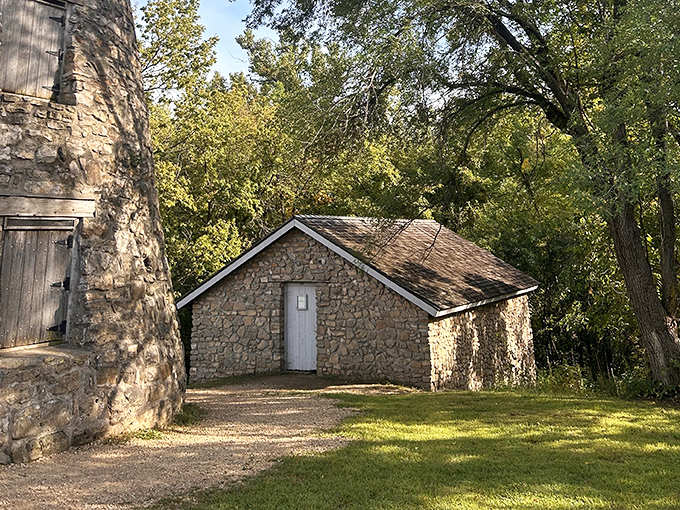 Pioneer craftsmanship meets prairie aesthetics in this beautifully preserved stone building, standing strong against Minnesota's seasons.
