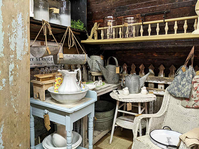 These galvanized watering cans and garden implements have nurtured countless plants through the seasons, their patina earned through years of faithful service.