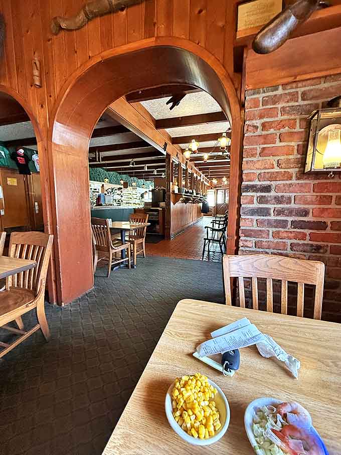 These wooden archways frame the dining room like a rustic picture frame, adding character without making you feel like you're eating in a barn.