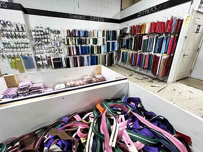 A zipper for every occasion lines the walls &ndash; proof that even the most utilitarian items come in rainbow varieties.