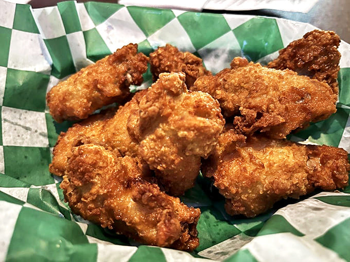 Chicken Wings: Golden-fried perfection with a satisfying crunch that gives way to juicy tenderness. Napkins required, regrets impossible.
