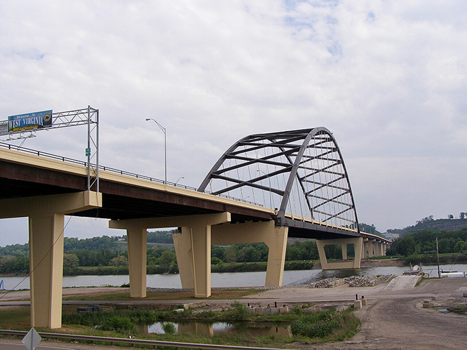 Engineering meets artistry in the distinctive X-pattern support structure of the Ohio River bridge, marking the end of your 200-mile journey.