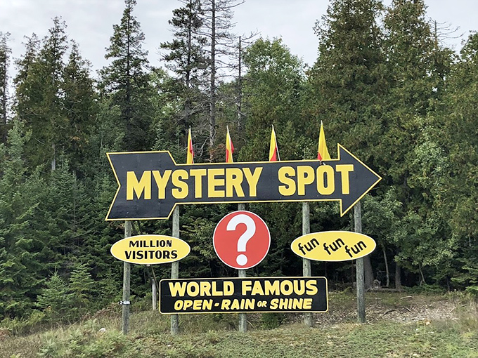 A bold arrow points the way to St. Ignace's famous phenomenon. The sign's promise of "fun fun fun" has lured over 2 million curious travelers to experience this Upper Peninsula mystery.