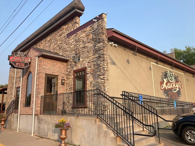 Lucky's 13 Pub's stone facade hides a Prohibition-era secret beneath &ndash; where history and mystery await curious visitors.
