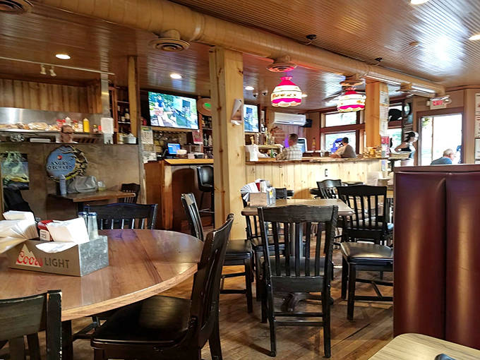 Warm wood paneling and vintage pendant lights create that perfect "everybody knows your name" vibe inside Meister's cozy dining room.