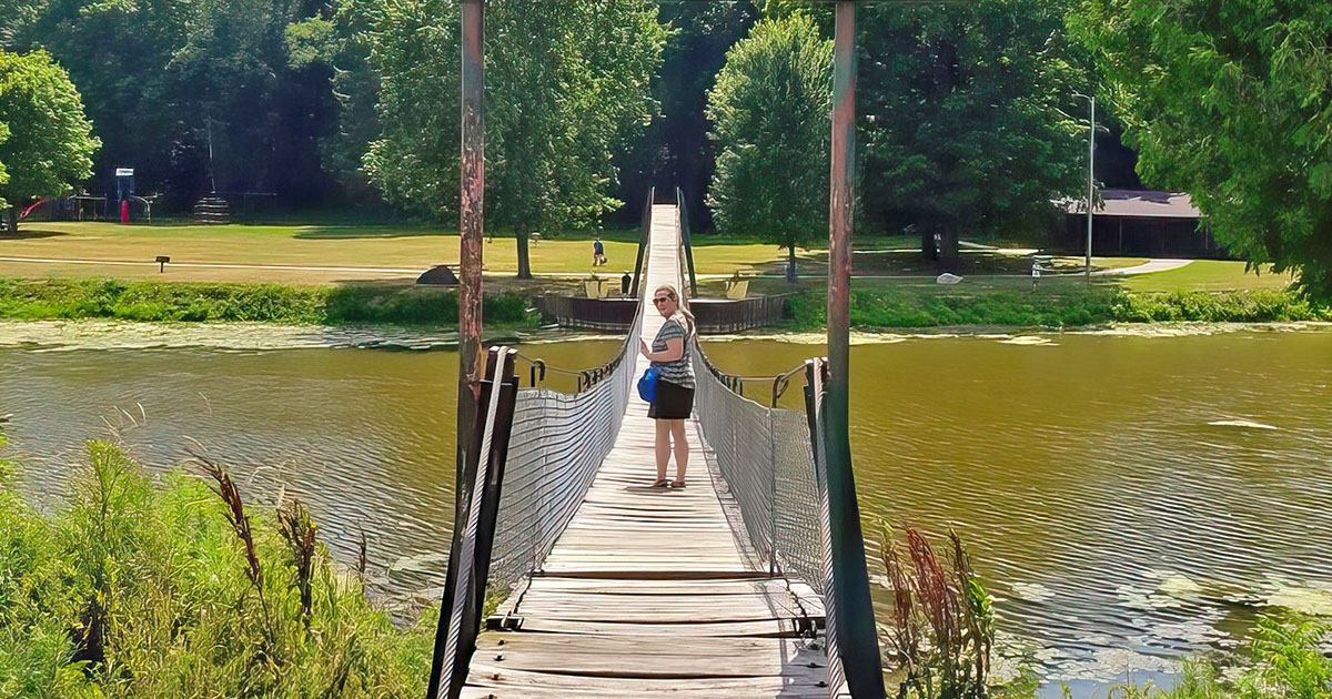 This 139-Foot-Long Swinging Bridge In Michigan Has Been A Local Icon ...