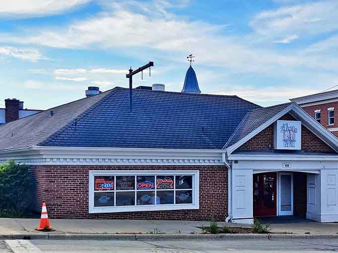 The unassuming brick facade of 2Toots Train Whistle Grill hides a wonderland of miniature locomotives and mouthwatering comfort food inside.