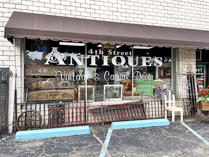 The unassuming storefront of 4th Street Antiques beckons with vintage charm, its classic awning and weathered sign promising treasures for those who venture inside.