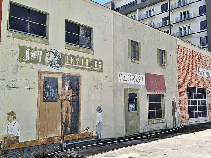 The vintage storefront mural transports you to another era before you even step inside this treasure-filled wonderland.
