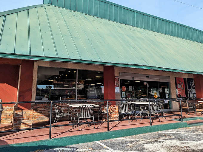 That green metal roof and brick exterior might look modest, but inside awaits some of Tampa's most authentic Cuban sandwiches and pastries worth writing home about.