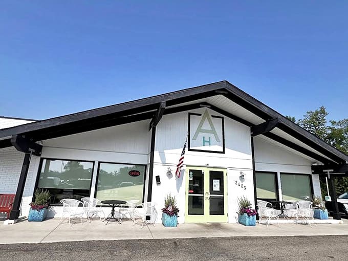 Anna's House welcomes hungry souls with its charming white exterior and teal accents – a breakfast beacon in Grand Rapids.