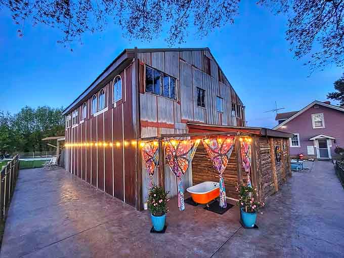 That's not a barn, that's a time machine disguised as a barn, complete with murals that make your eyes happy and an orange bathtub that somehow makes perfect sense.