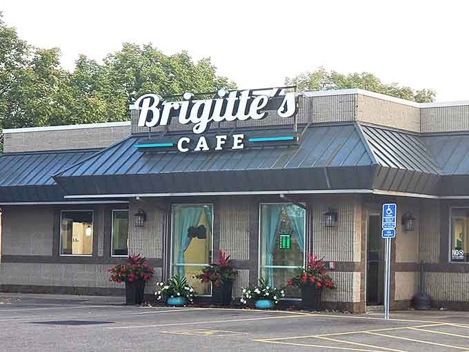 Brigitte's Cafe stands proudly in St. Cloud, its blue-trimmed roof and welcoming entrance promising comfort food that'll make your cardiologist wince and your soul sing.