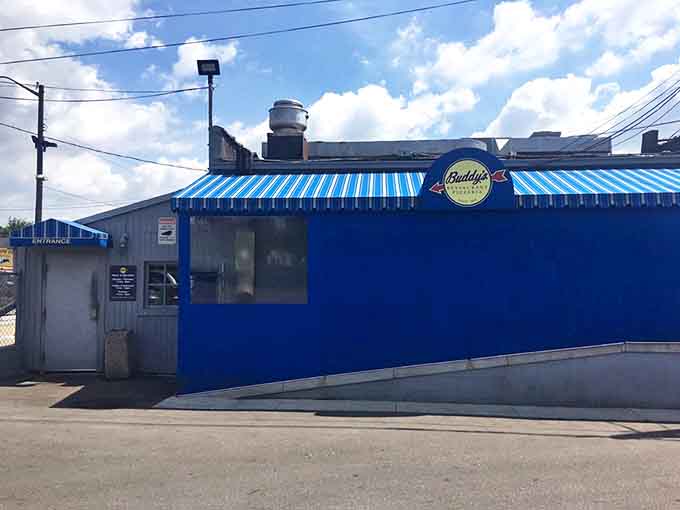 The iconic blue exterior of Buddy's Pizza stands as a beacon of Detroit culinary history, promising square pizza perfection within its humble walls.