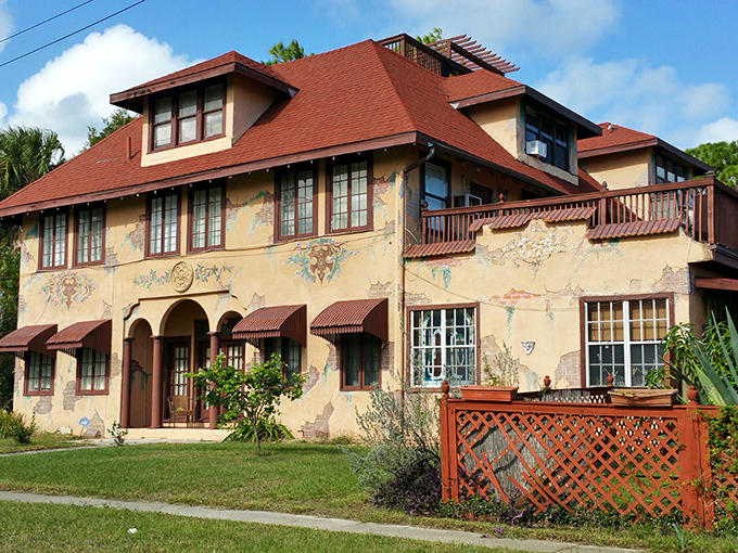 Casa Coquina's weathered stucco facade tells stories of bygone eras, standing proudly like a Mediterranean duchess who found herself in Florida.