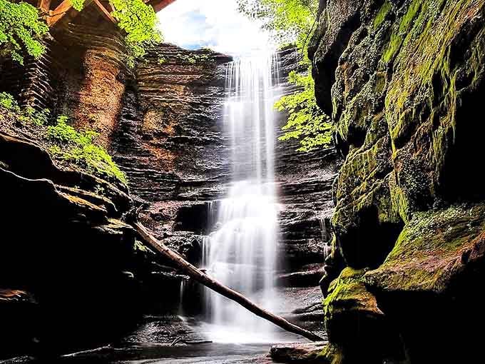 Nature's masterpiece in motion: Cascade Falls plunges 45 feet through ancient rock formations, creating a misty veil that dances with sunlight.