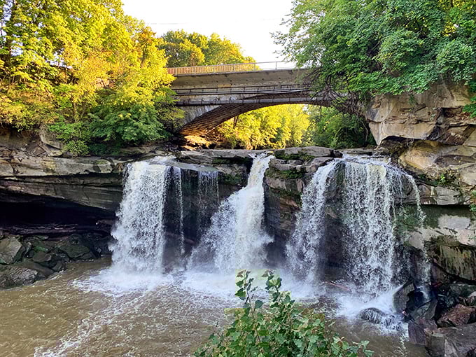 Nature's own masterpiece – West Falls of Cascade Park creates a symphony of rushing water beneath a historic stone bridge. Ohio's answer to Niagara, minus the honeymoon suites.
