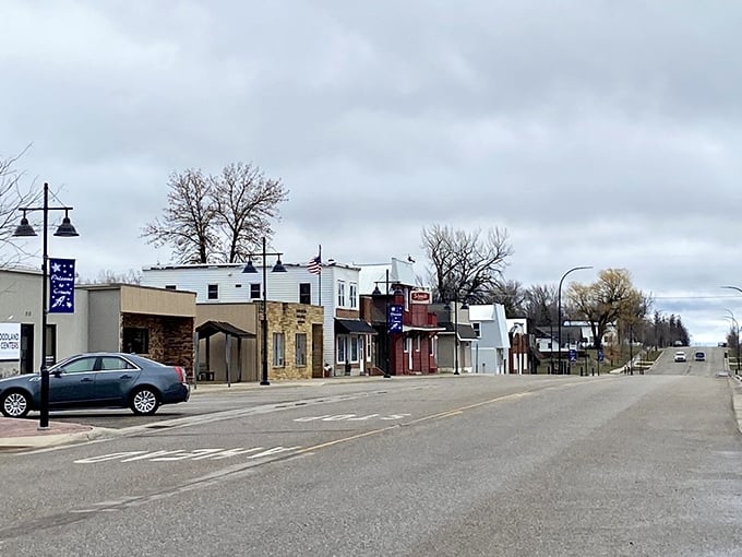 Main Street Cosmos stretches before you like a quiet runway to the stars, its modest storefronts holding small-town treasures waiting to be discovered.