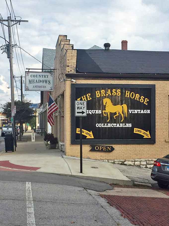 The golden brass horse beckons treasure hunters to this Alton antique paradise where history lives on every shelf.