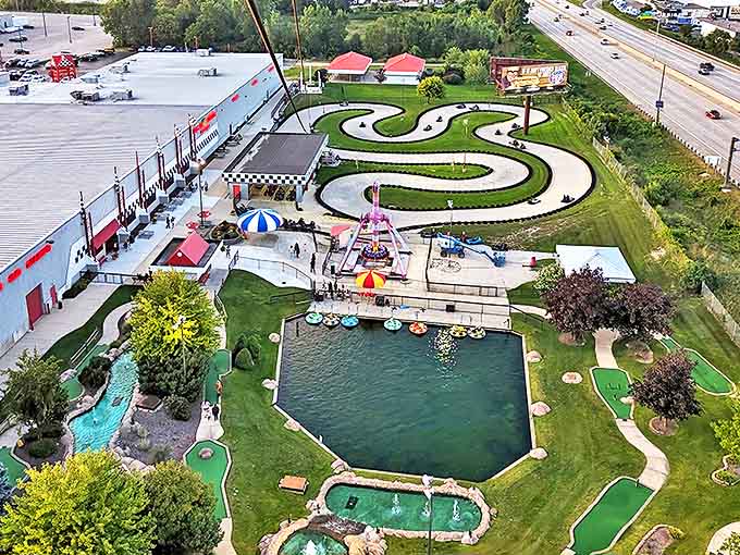 An aerial paradise of family fun where go-karts wind like ribbons and water features sparkle under Michigan skies.