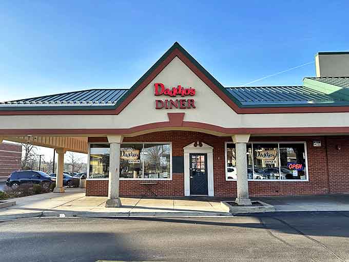 Daddio's red signage beckons like a lighthouse for the breakfast-starved, promising comfort food salvation in suburban Batavia.