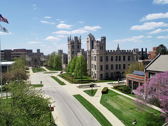 DeKalb's stunning campus architecture stands as a testament to educational excellence, where limestone towers reach skyward against Illinois' brilliant blue skies.