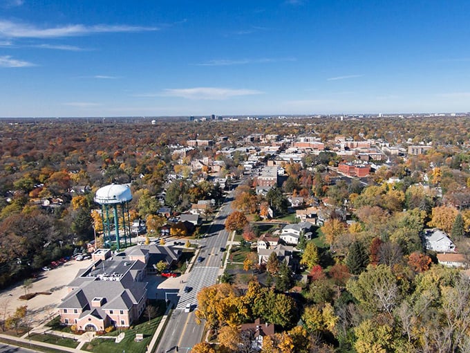 Downers Grove unfolds like a patchwork quilt of autumn colors, its water tower standing sentinel over tree-lined streets and welcoming neighborhoods.
