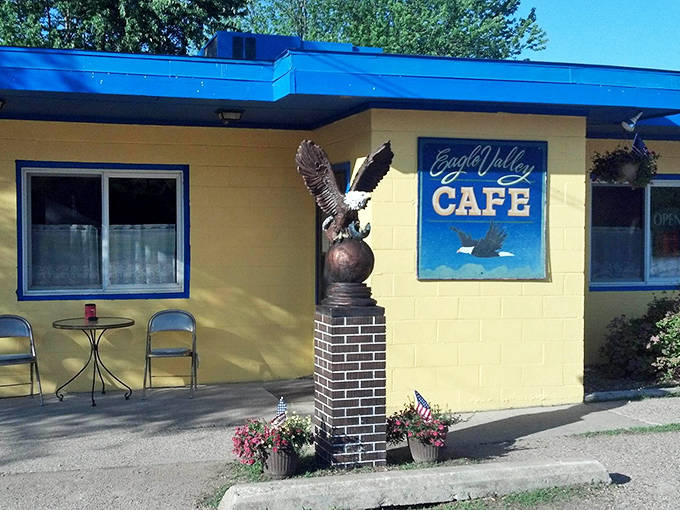 The cheerful yellow exterior with bright blue trim makes the Eagle Valley Cafe stand out like a beacon of comfort food hope along the roadside.