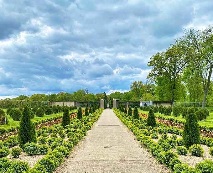 Allerton Park & Retreat Center (Monticello, IL): A perfectly manicured pathway stretches toward infinity, flanked by emerald hedges under moody skies. Nature showing off its organizational skills!